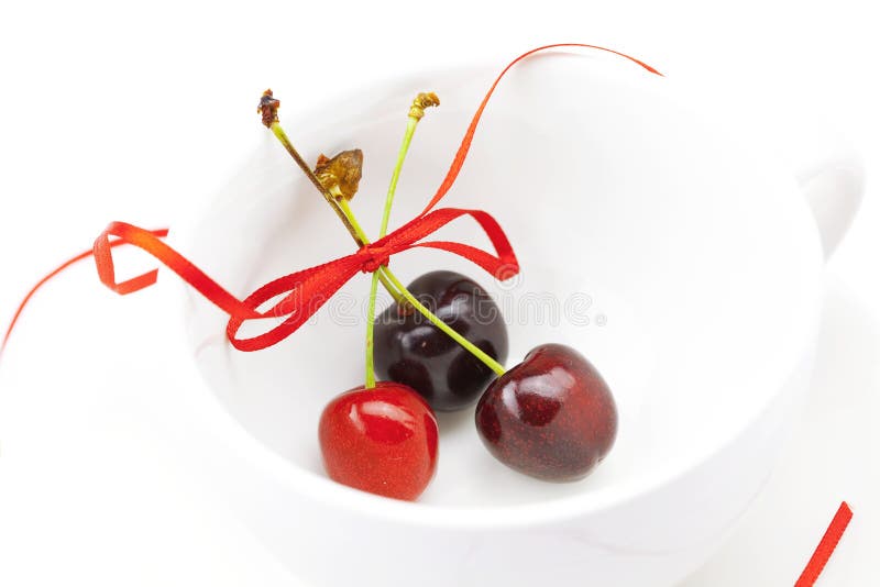 Cherry with Ribbon in the Cup Isolated on a White Stock Photo - Image ...