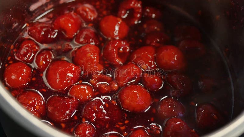 Cherry in Syrup, Boiled Cherry. Boiling Raspberry Syrup Stock Image ...