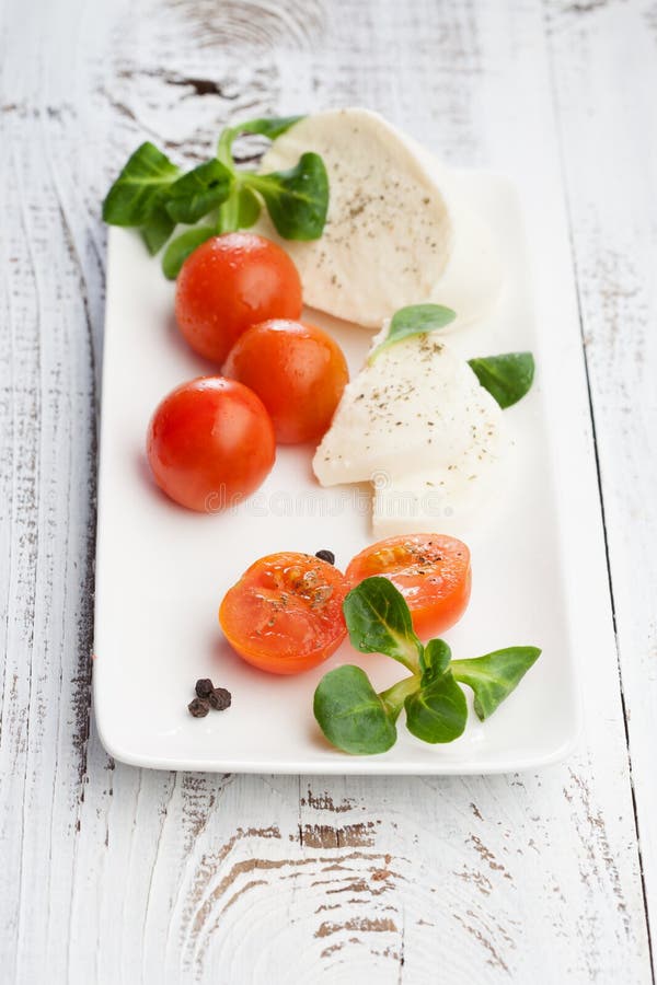 Cherry Tomatoes with Mozzarella Stock Photo - Image of organic ...