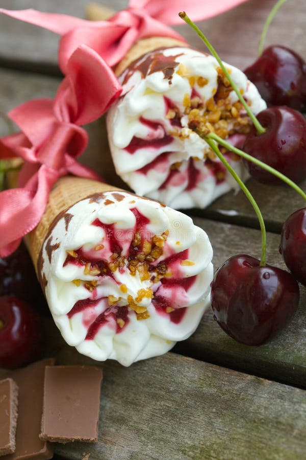 Cherry Vanilla Ice-cream with Caramel Topping. Closeup Stock Photo ...