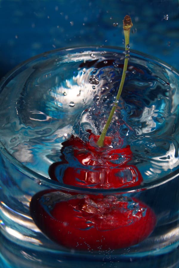 Cherry Water Splash stock image. Image of gean, alcohol - 1022431