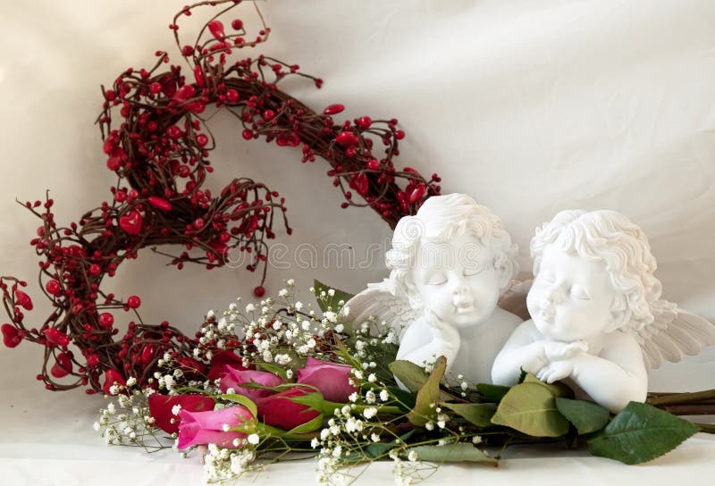 Cherubs and Roses without a Vase Stock Photo - Image of roses, presents ...