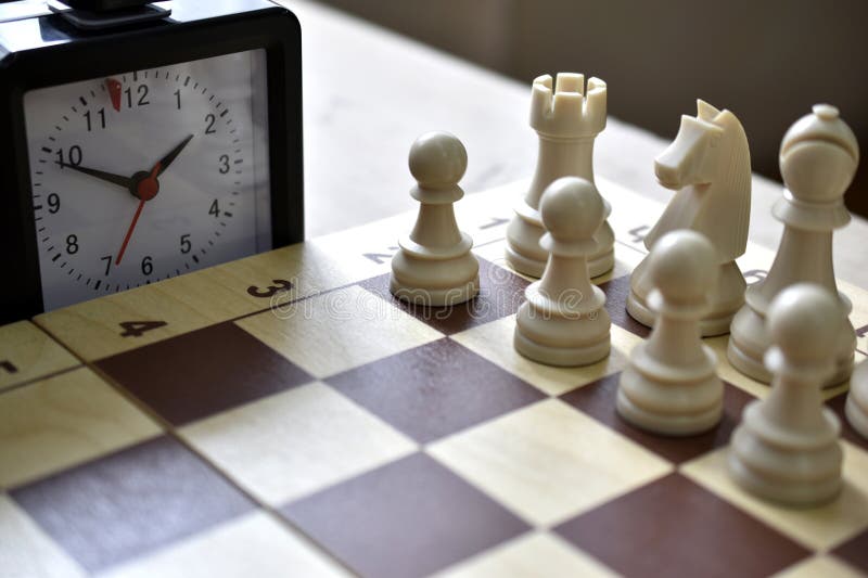 A Chess Board and a Chess Clock. Chess Competitions Stock Photo - Image ...