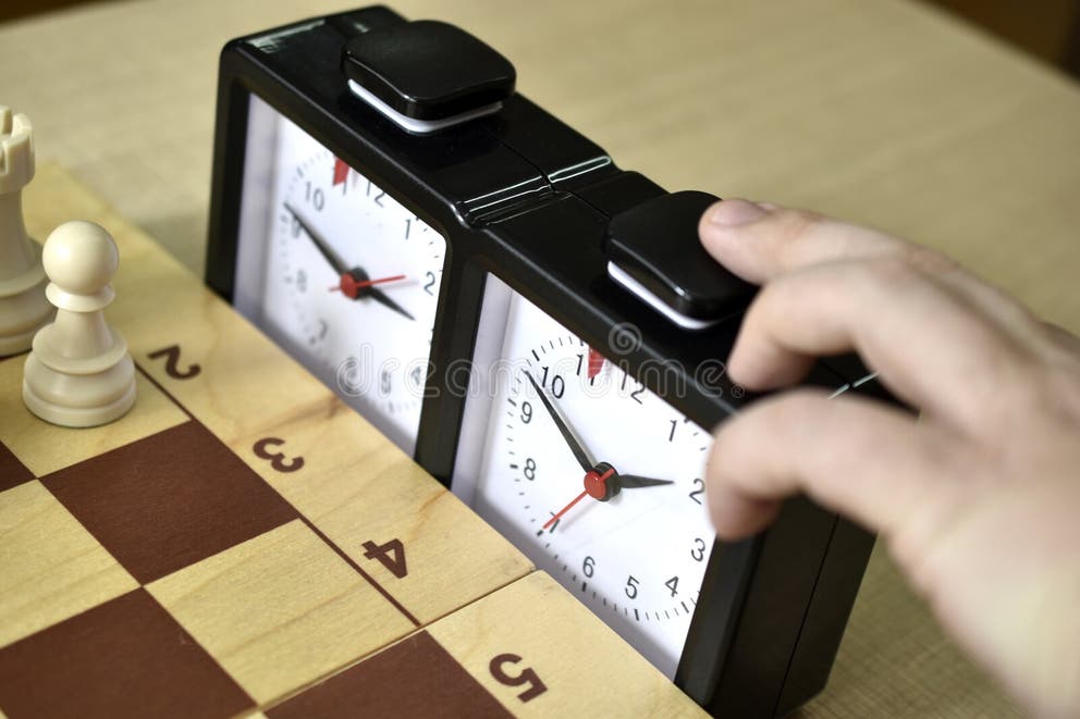A Chess Board and a Chess Clock. Chess Competitions Stock Image - Image ...