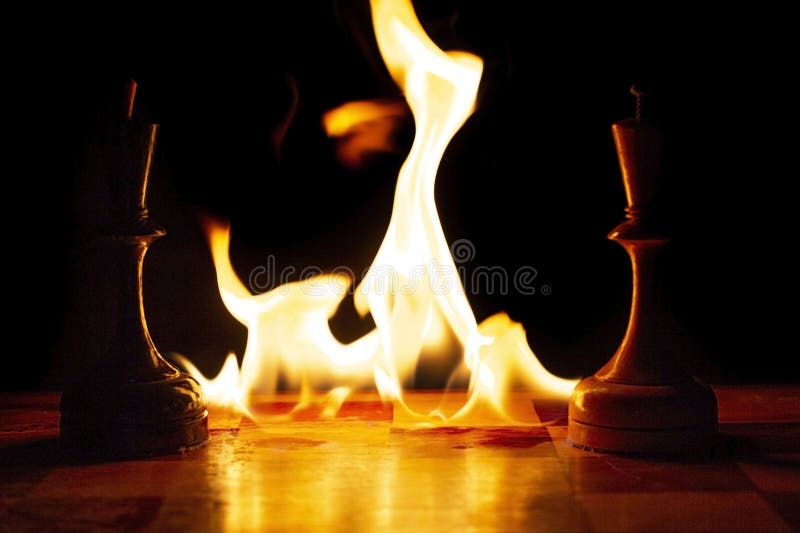Chess Board on Fire with Figures in the Dark, Front and Background ...