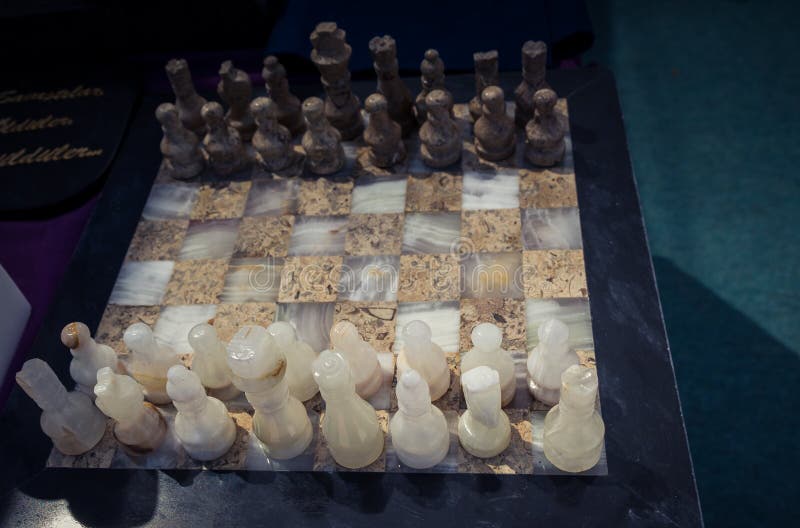 Chess Board on a Glass Table on Display Stock Image - Image of ...