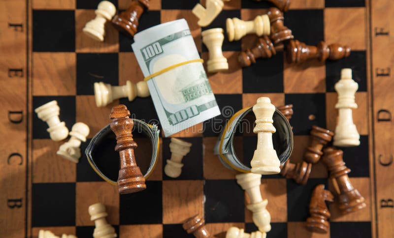 Chess Figures and Dollar Money on the Chessboard Stock Photo - Image of ...