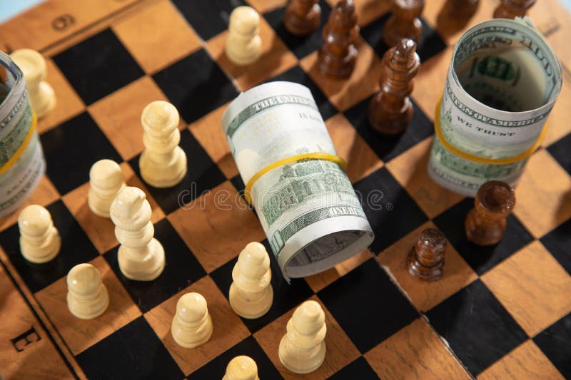 Chess Figures and Dollar Money on the Chessboard Stock Photo - Image of ...