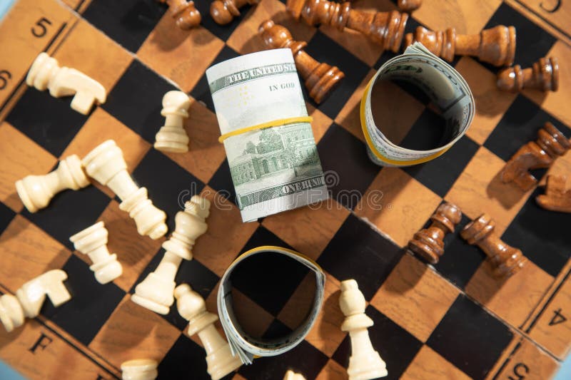 Chess Figures and Dollar Money on the Chessboard Stock Photo - Image of ...