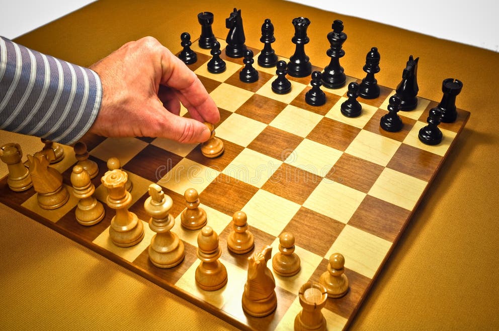 Chess. First move. stock image. Image of hand, color - 13537303