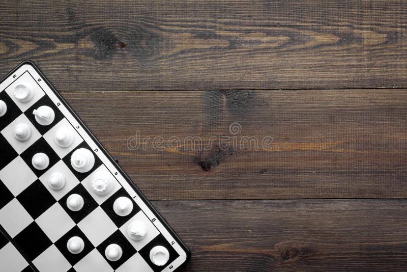 Chess Game Concept. Chess Board with Figures on Dark Wooden Background ...