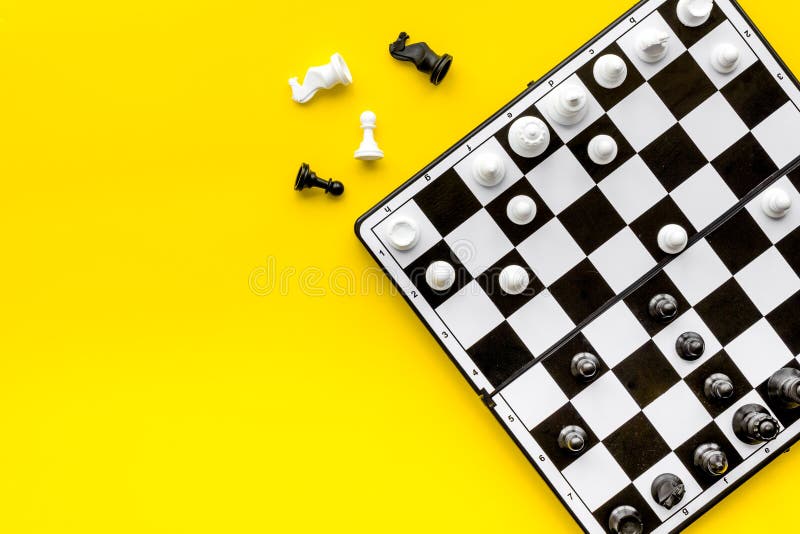 Chess Game Concept. Chess Board with Figures on Yellow Background Top ...