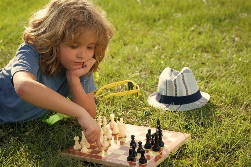 Chess Game for Kids. Child Playing Chess Outdoor in Park. Stock Image ...