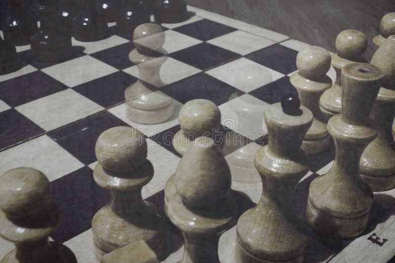 Chess game pawn E2-E4 ... stock image. Image of wood - 201335591