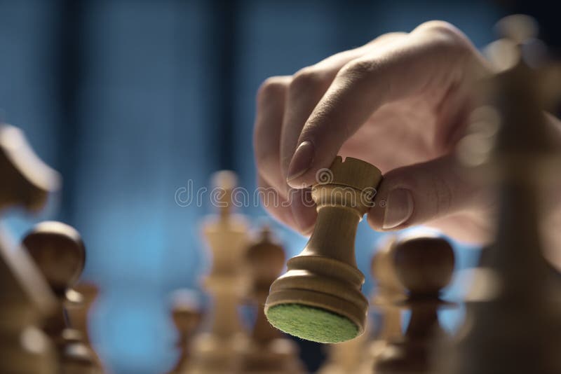 Man Moving a Piece on the Chessboard Stock Image - Image of piece ...