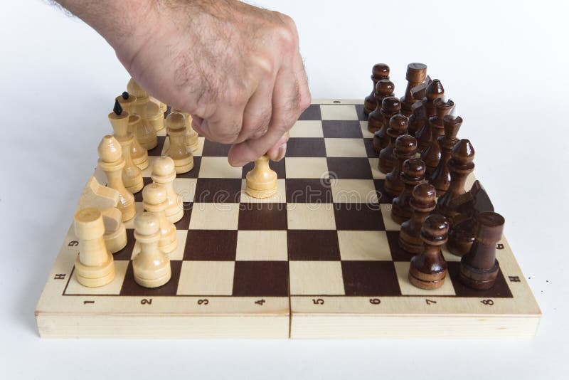 The Man`s Hand Makes the First Move E2-E4. Stock Photo - Image of game ...