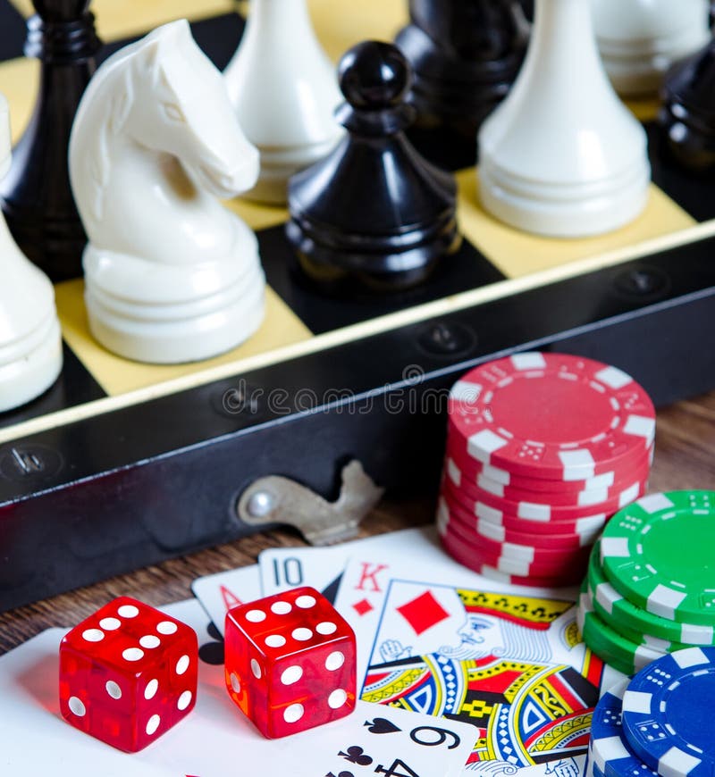 Chess and Other Gaming Accessories Stock Photo - Image of chip, bishop ...