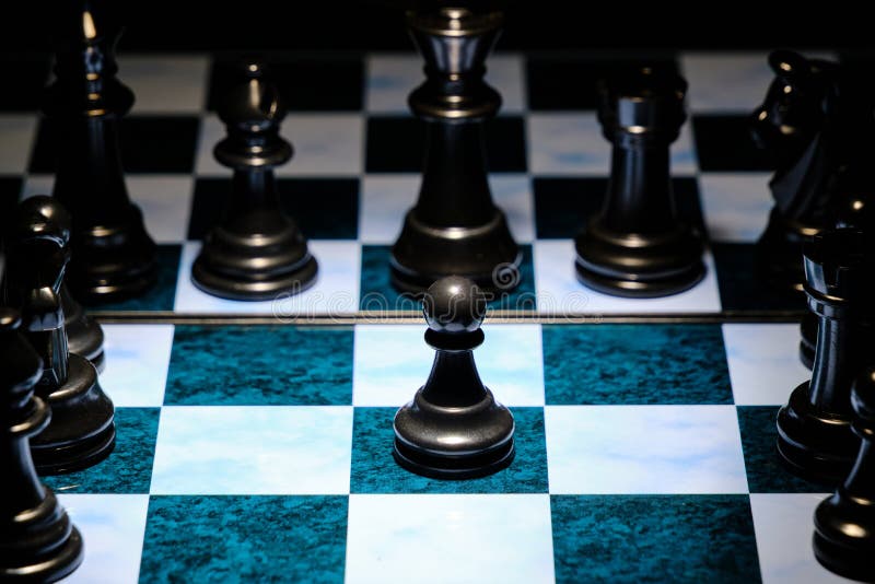 Chess Pieces Around Pawn on Chess Board Stock Photo - Image of ...