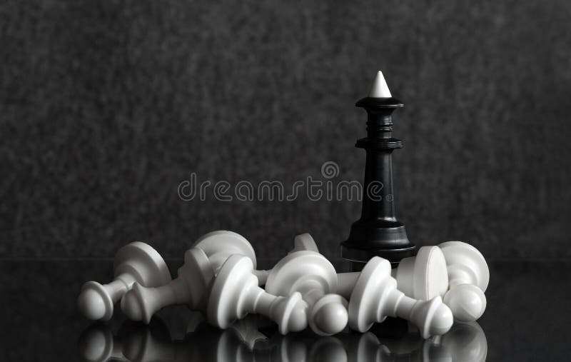 Chess Pieces. Black Chess King. White Chess Pieces is Defeated Stock ...