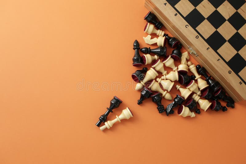 Chess Pieces and Board on a Orange Background Stock Image - Image of ...