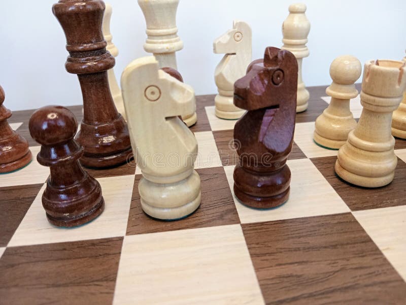 Chess Pieces on a Checkered Board Stock Image - Image of object, piece ...