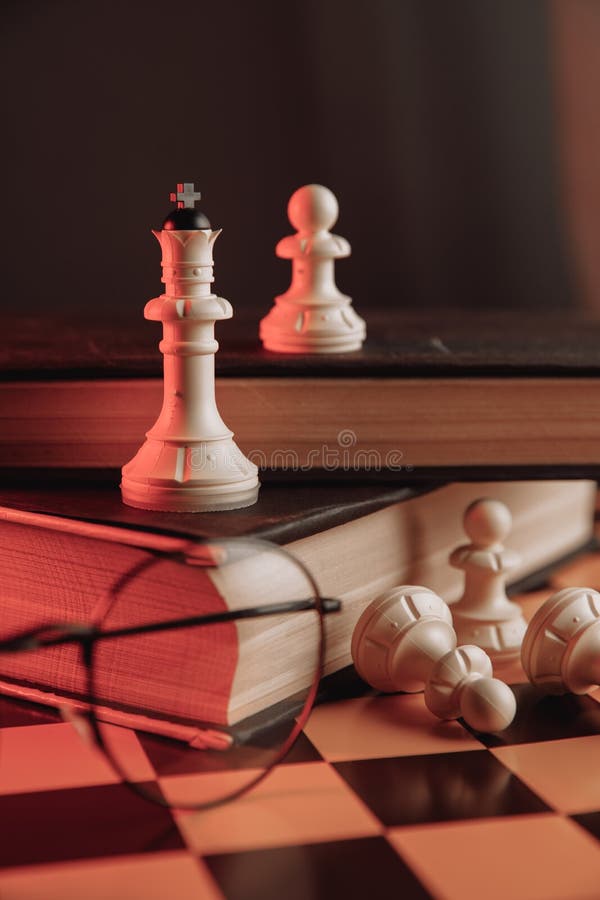 Chess Pieces on the Chessboard with Books. Business and Strategy ...