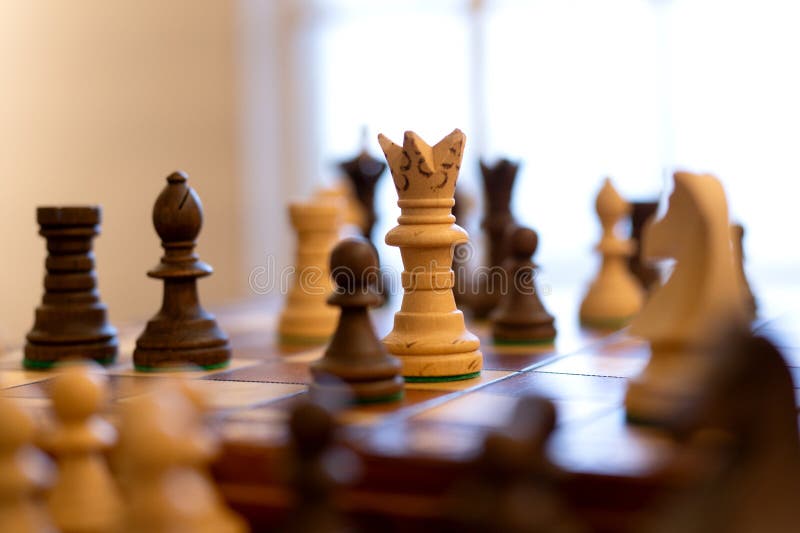 Chess Pieces on a Chessboard Stock Photo - Image of turn, intelligence ...