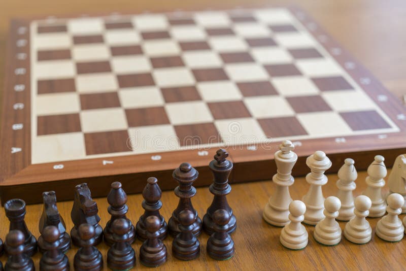 Chess Pieces in Front of a Chessboard Stock Photo - Image of ...