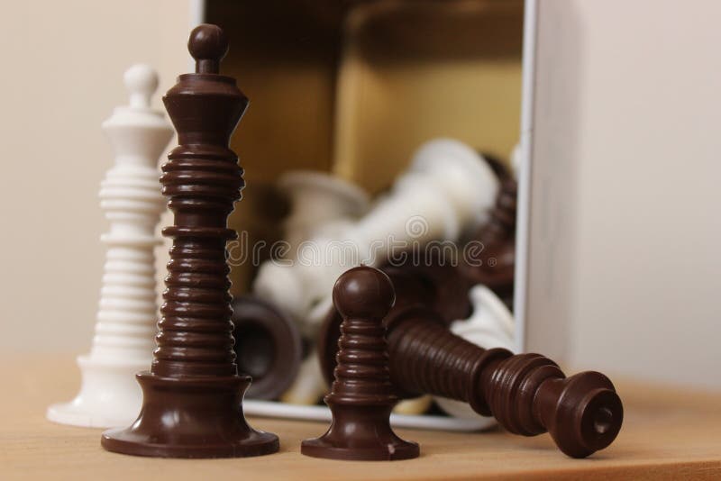 Chess Pieces in Front of a Metal Container Stock Photo - Image of chess ...