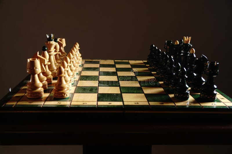 Chess Pieces before the Game. Chess Board on the Table Stock Photo ...
