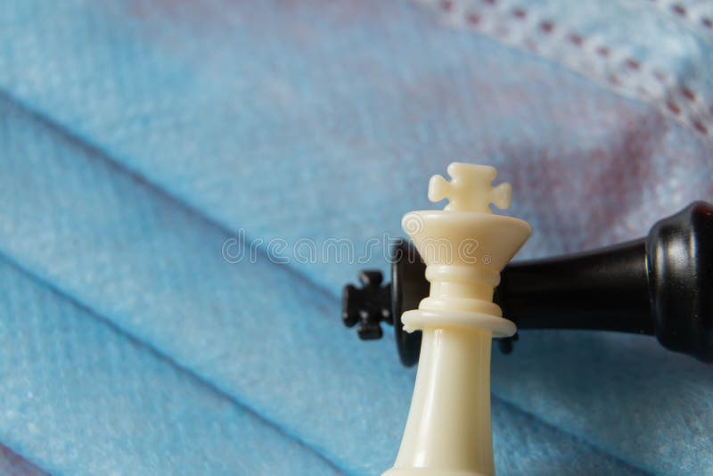 Chess Pieces on a Medical Mask on an Isolated Background Stock Image ...