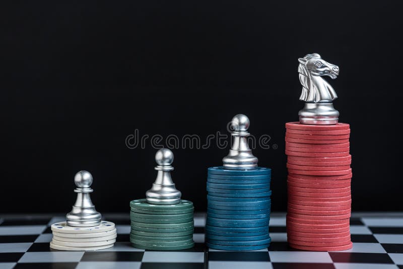 Chess Pieces on Stack of Casino Chips Stock Photo - Image of gambling ...