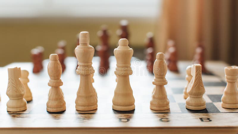 Chess Pieces Stand on a Chessboard Close Up Stock Image - Image of ...
