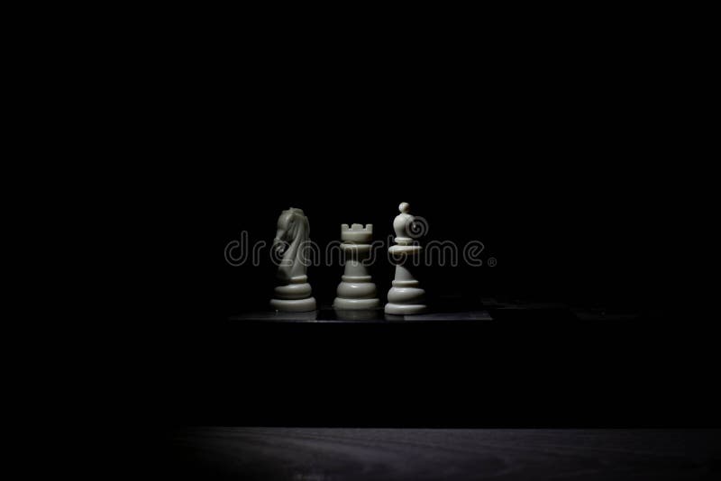 Chess Pieces Under the Light in the Dark Stock Photo - Image of chess ...