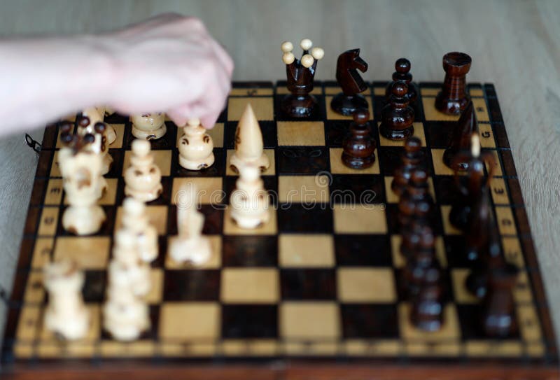 Chess player`s hand. stock photo. Image of competition - 195520760