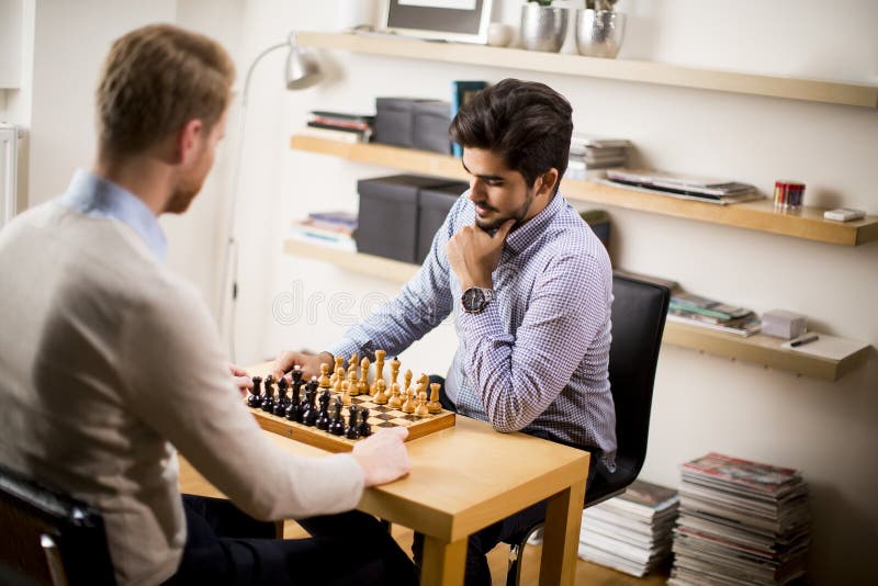 Chess playing stock photo. Image of room, piece, friends - 114297996