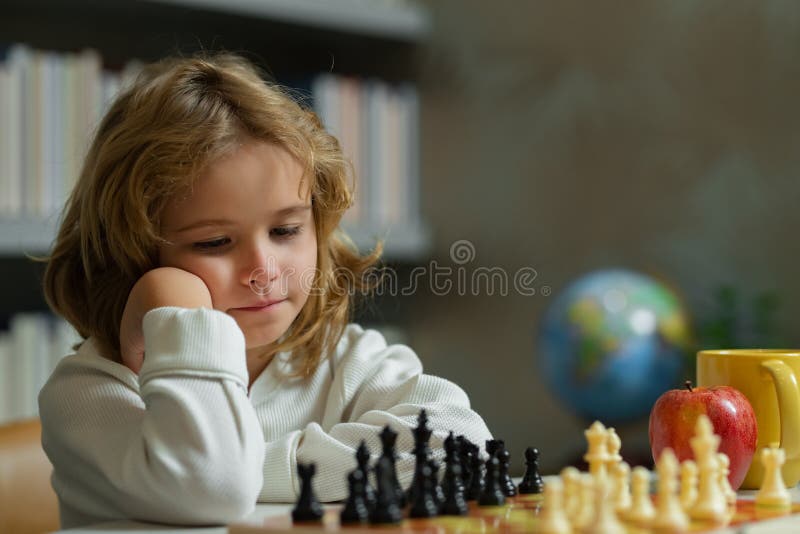 Chess School. Child Think or Plan about Chess Game in Classroom ...