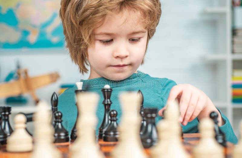 Chess Strategy. Kid Playing Chess. Thinking Kid. Stock Photo - Image of ...