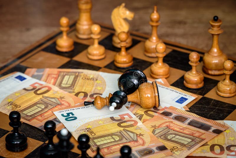 Chess Table with Figures and Real Money Stock Image - Image of finance ...