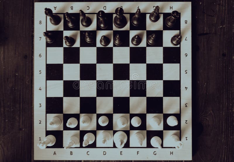 Chessboard and Chess Pieces on a Dark Brown Table Stock Image - Image ...