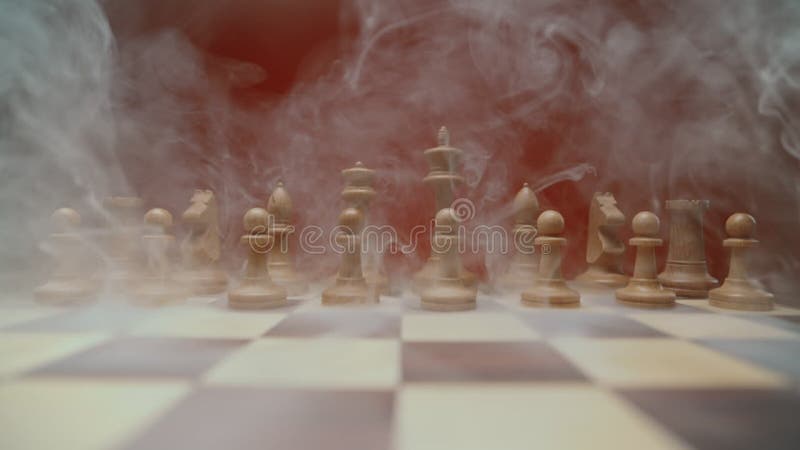 Chessboard in Smoke with Pieces Placed. Red Background Stock Video ...