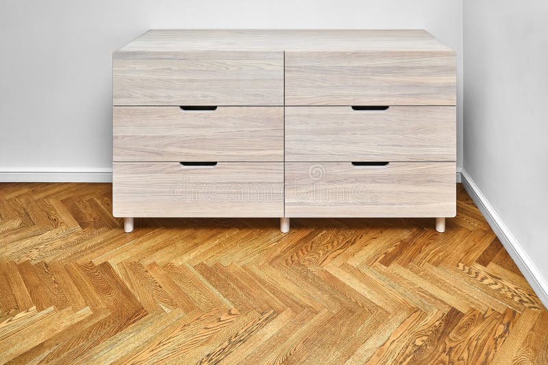 Chest of Drawers with Bleached Solid Oak Stands on Parquet Floor ...