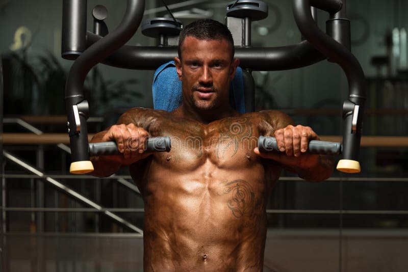 Chest Exercises on a Machine Stock Photo - Image of chest, adult: 68352658