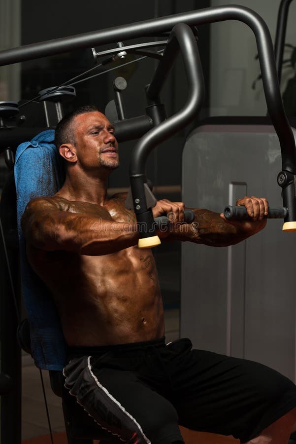 Chest Exercises on a Machine Stock Photo - Image of health, club: 68352818