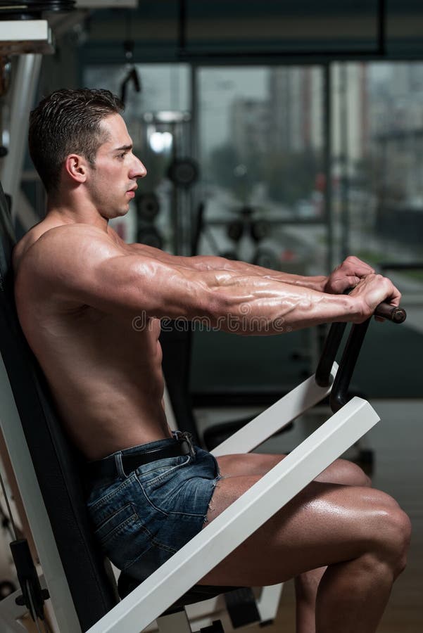 Chest Exercises on a Machine Stock Photo - Image of health, healthy ...