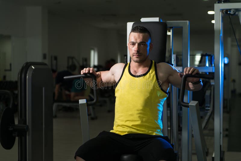 Chest Exercises on a Machine Stock Photo - Image of picking, abdominal ...