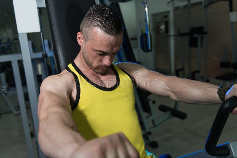 Chest Exercises on a Machine Stock Image - Image of building, human ...