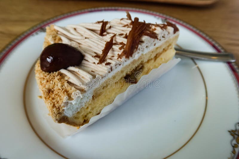 Chestnut Cream Sponge Cake on a Old Traditional Plate with Copy Space ...