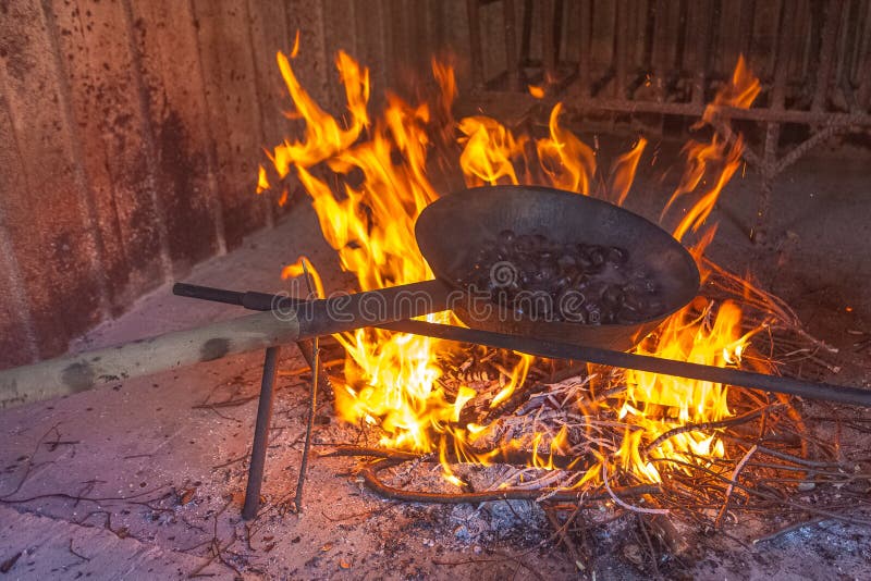 Chestnuts Cooked on a Pan Over the Fire Stock Image - Image of fire ...