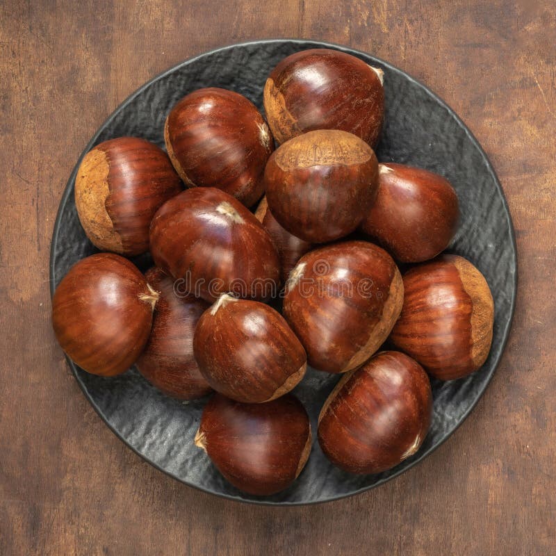 Chestnuts on on an Old Board with Copy Space. Autumn Mood Stock Photo ...